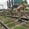Maoists blow up train track