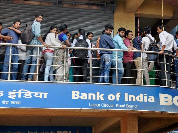 Photos say it all: How India lined up to get cash at banks, ATMs