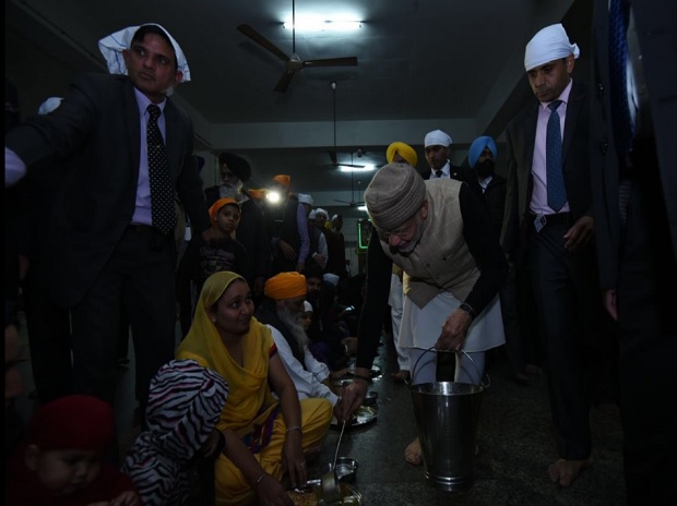 In pictures: Narendra Modi becomes first PM to serve langar at Golden ...