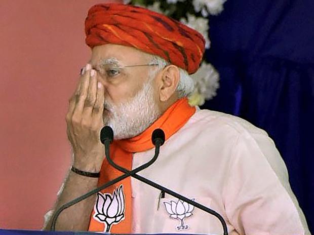 Those born with gold spoon mocking poor man's sweat: Modi on Rahul's ...