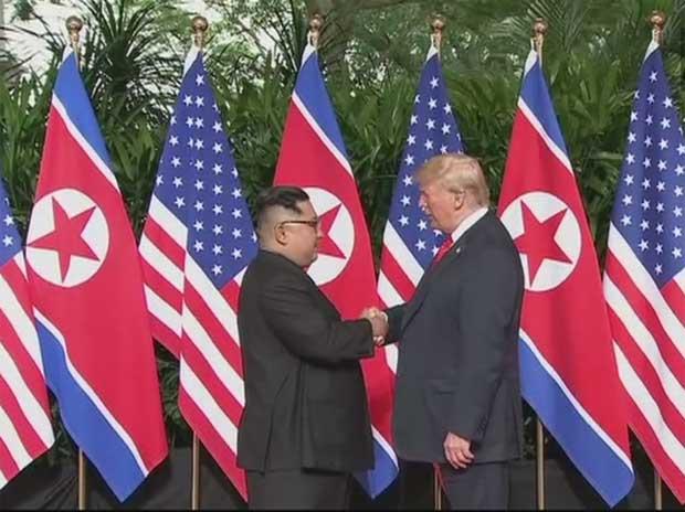 Here's what body language experts are saying about Trump, Kim's ...