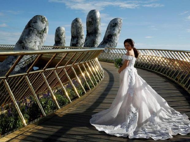 In pics: 'God's hands' cradle Vietnam's Golden Bridge | Business ...