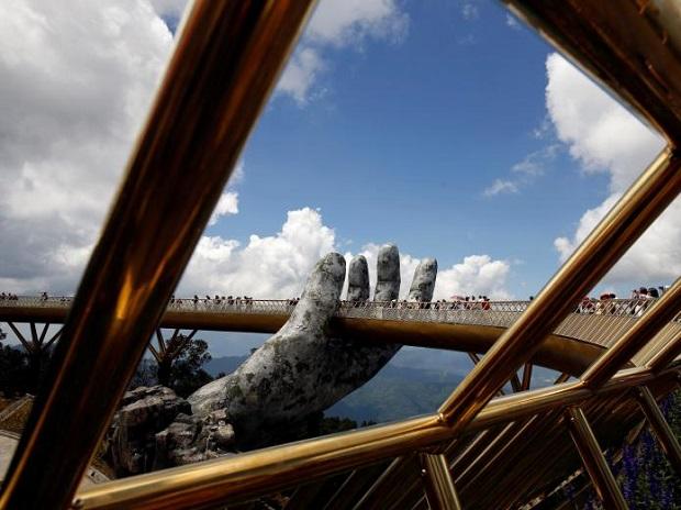 In pics: 'God's hands' cradle Vietnam's Golden Bridge | Business ...