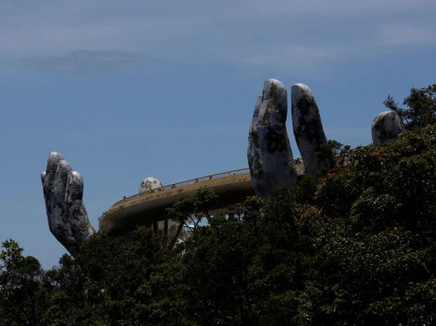 In pics: 'God's hands' cradle Vietnam's Golden Bridge