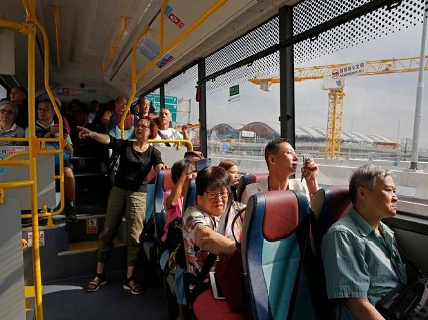 In pics: World's longest sea crossing bridge opens to public in China