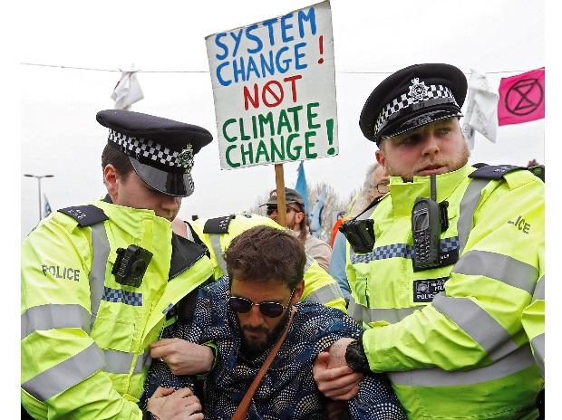 300 arrested as climate change protests bring London to a standstill