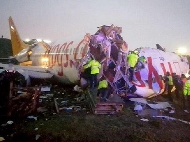 Plane carrying 177 passengers skids off runway in Istanbul, breaks into two