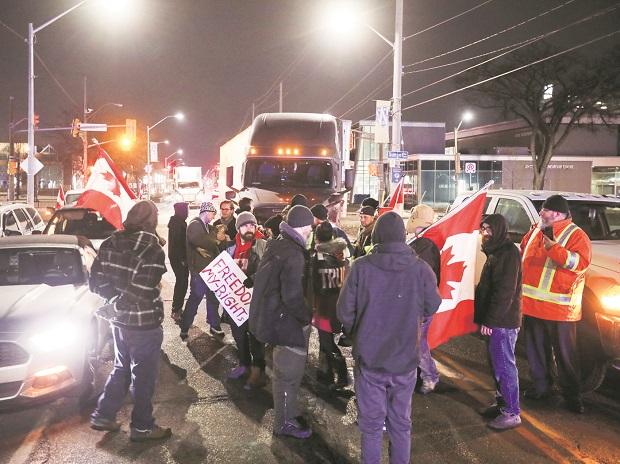 Trucker blockade knocks out Ford, Toyota and General Motors plants ...