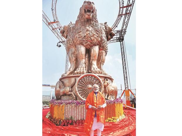 PM Modi unveils national emblem atop Parliament building, Oppn slams ...