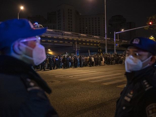 China uses cops, social media censors, quiet Covid easing to stem ...