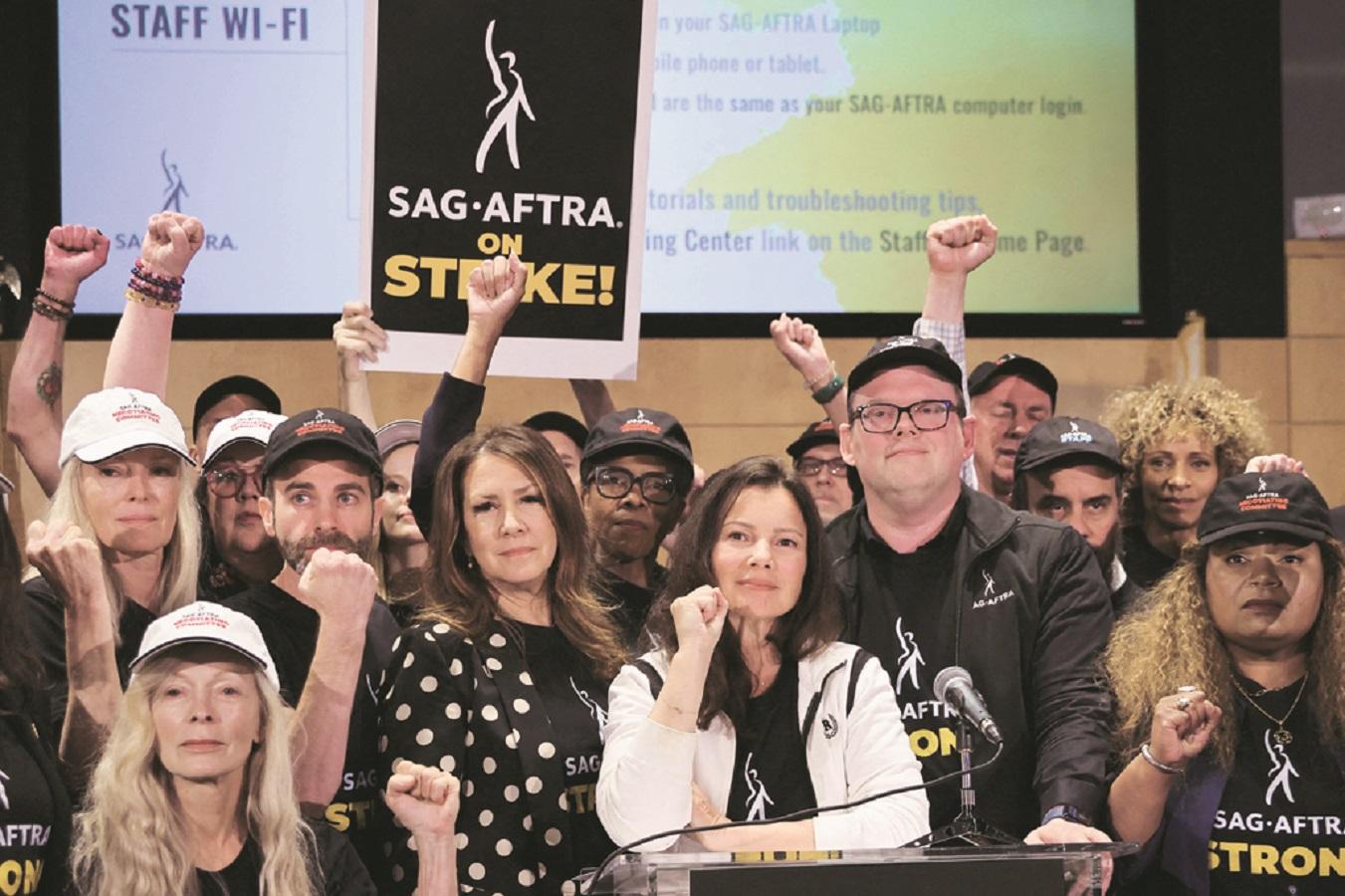 Actors begin picketing alongside writers in fight over future of ...