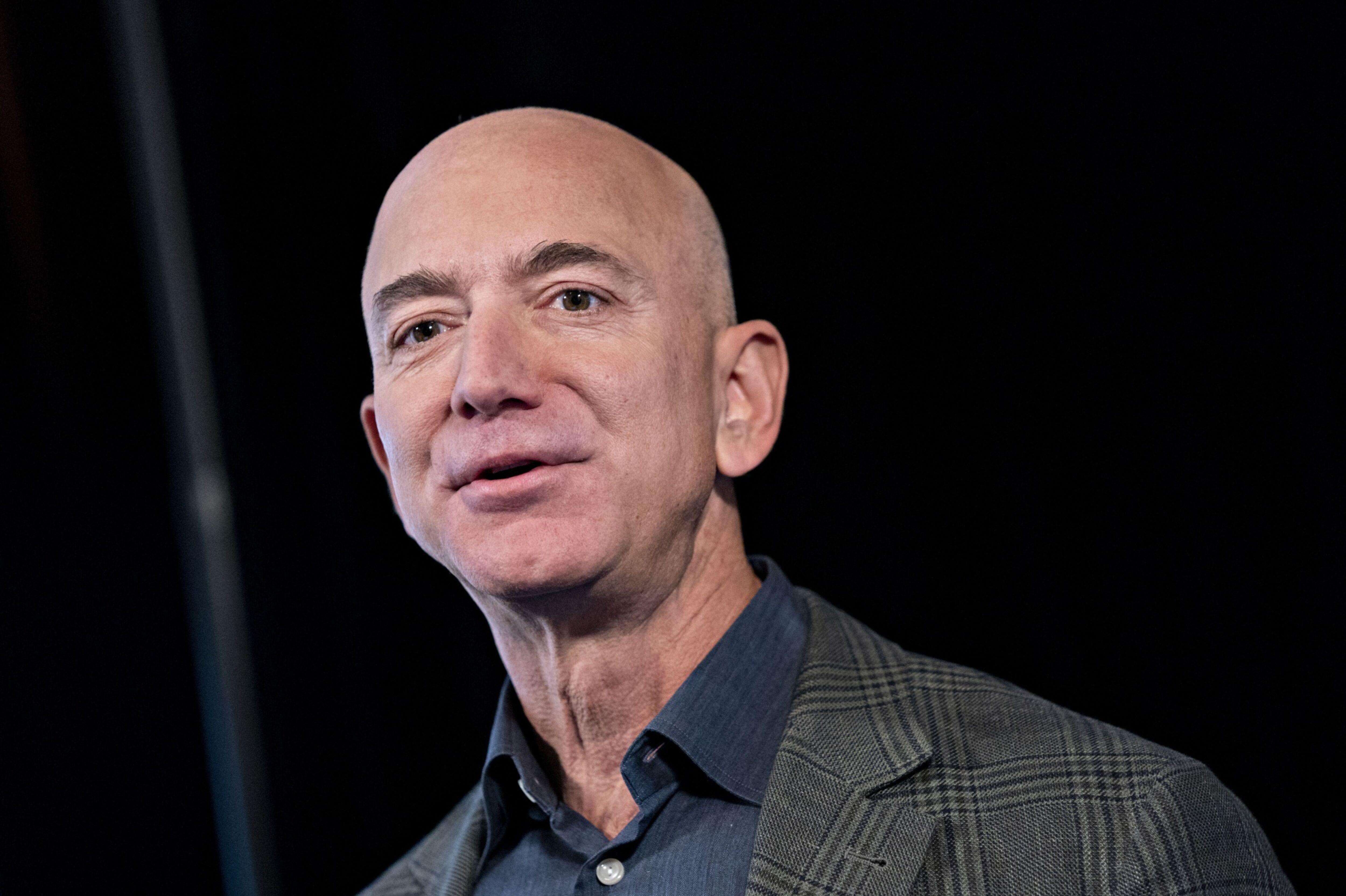 Billionaire space battle heats up as Jeff Bezos eyes SpaceX rival ...