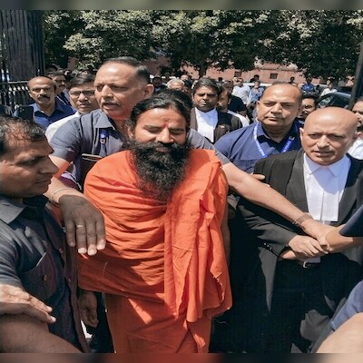 Ramdev, Balkrishna file 'unconditional' apology in Patanjali ad case ...