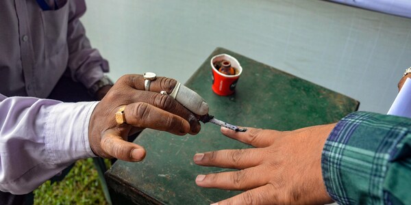 Near China border, people at world's highest polling booth get inked ...