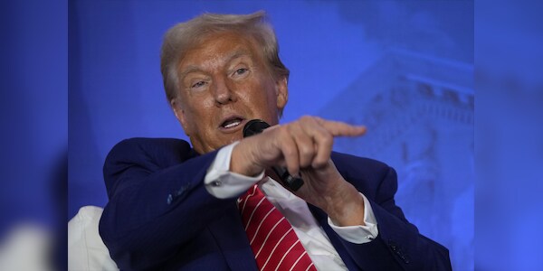 Man arrested at Trump rally wanted to hang protest banner, say police ...