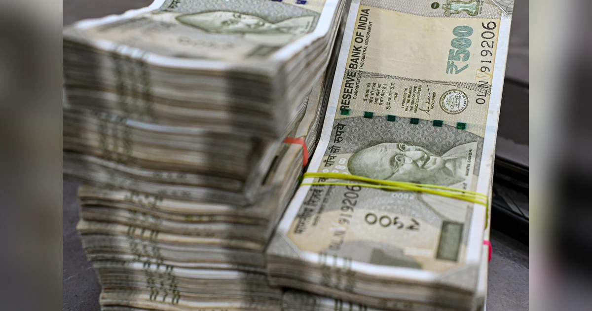 Rupee Today: Rupee ends near record lows even as oil prices slide ...