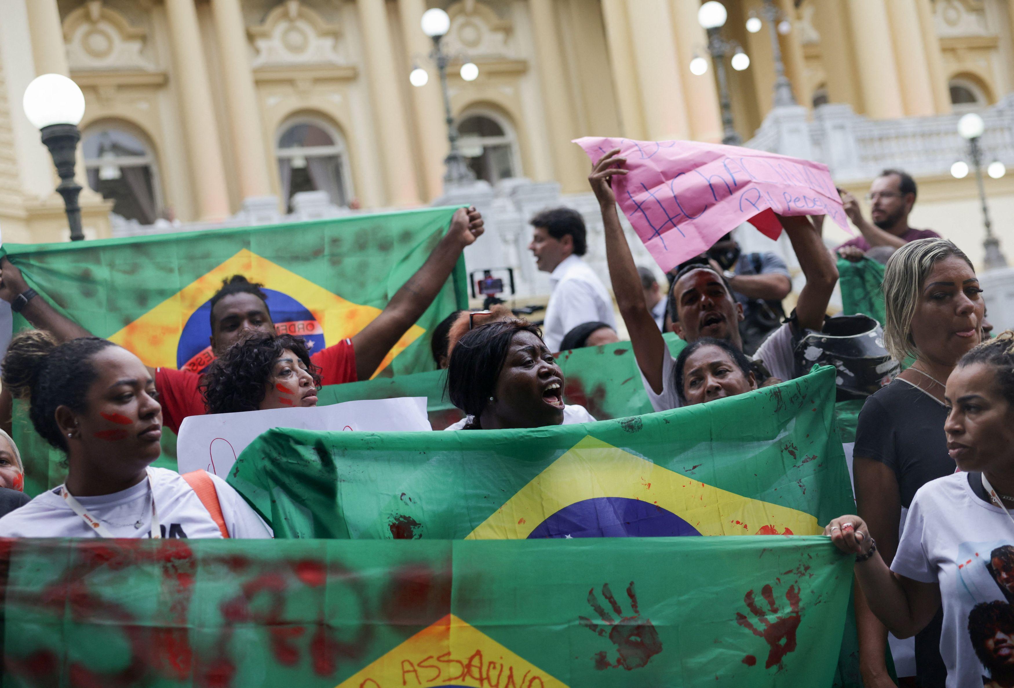 Protests erupt in Brazil after police raid leaves at least 119 dead ...