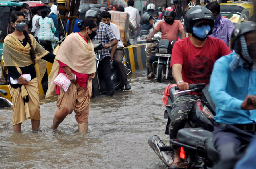 In pictures: Rains end heat spell but bring floods and landslides too ...