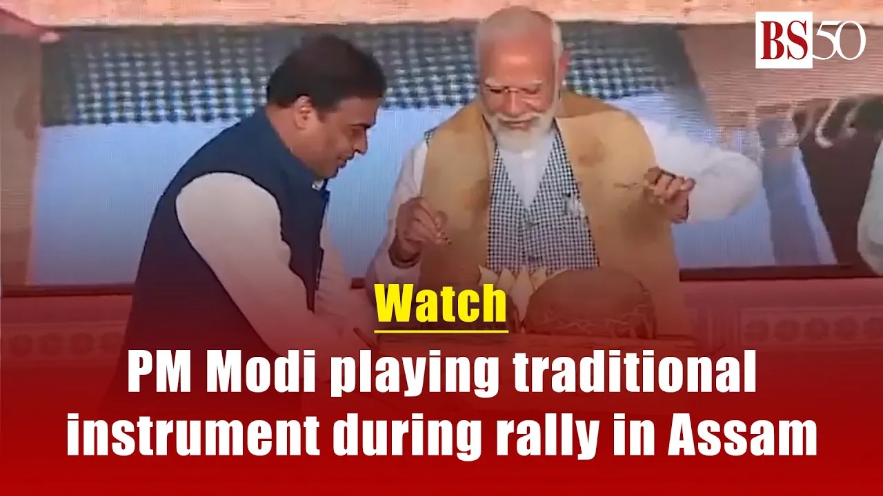 Watch: PM Modi playing traditional instrument during rally in Assam ...