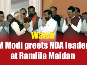 Delhi CM oath ceremony: PM Modi greets NDA leaders at Ramlila Maidan